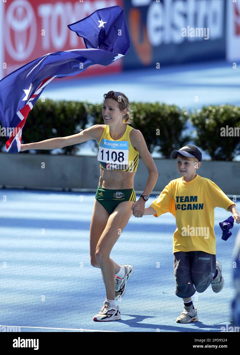 Australia's Kerryn McCann celebrates with her son Brenton after winning ...