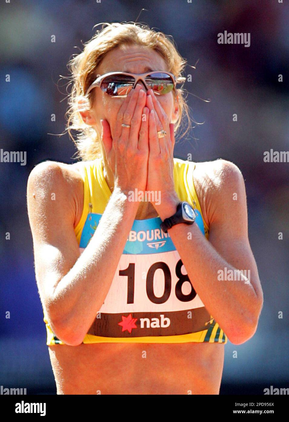Australia's Kerryn McCann reacts after winning the gold medal in the ...
