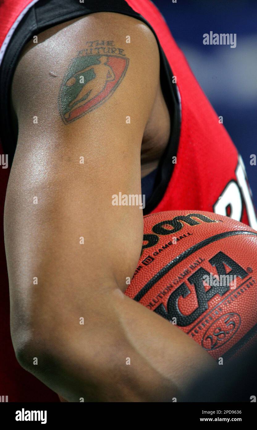 Rutgers' Cappie Pondexter sports a tattoo that says "The Future" with ...