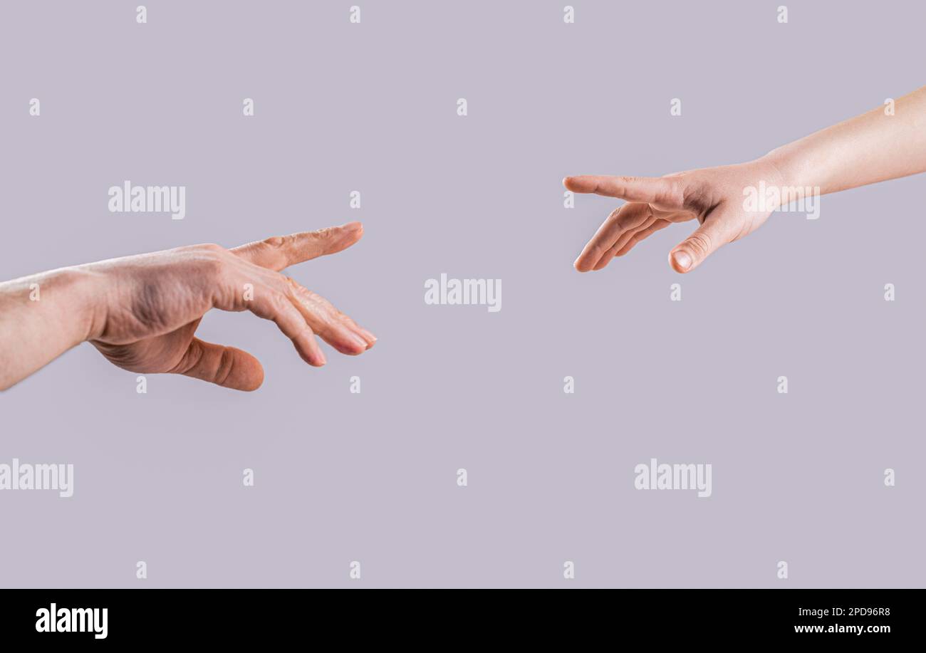 Small child's hand reaches for the hand man. Helping hand concept ...