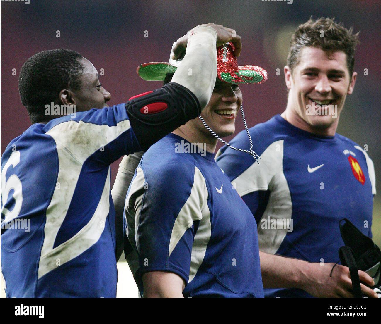 France's Yannick Nyanga, left, Pieter De Villers, center, and Jerome ...