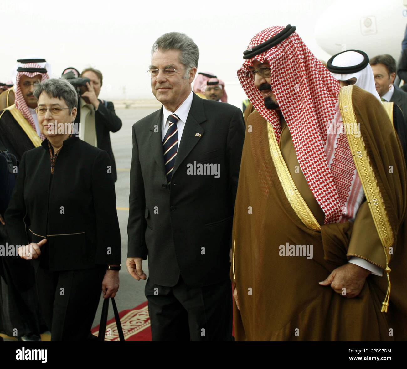 Austrian President Heinz Fischer, center, and his wife Margit, left ...