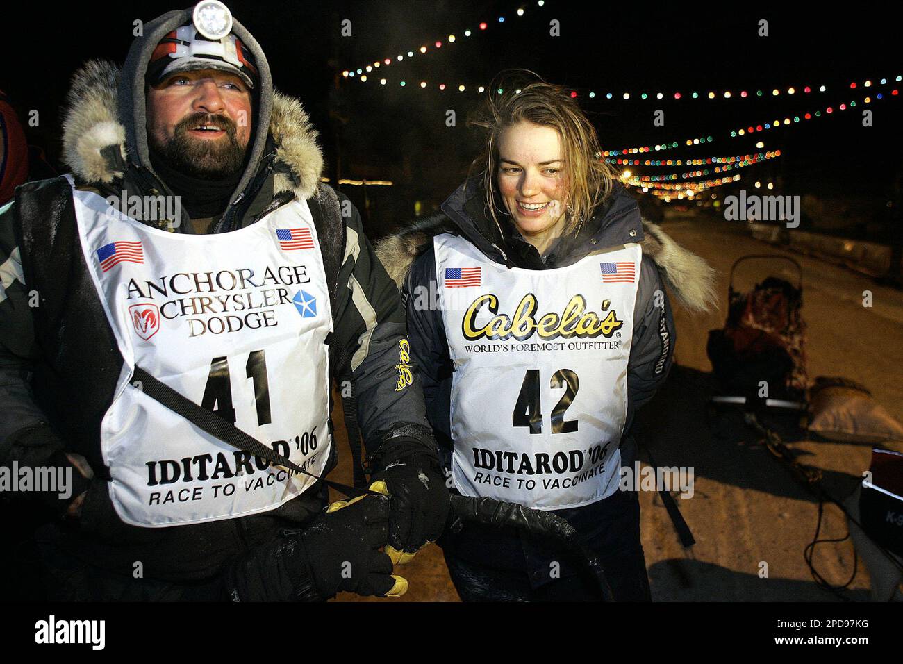 Tim Osmar of Ninilchik, Alaska, left, who drove his dog team in front ...