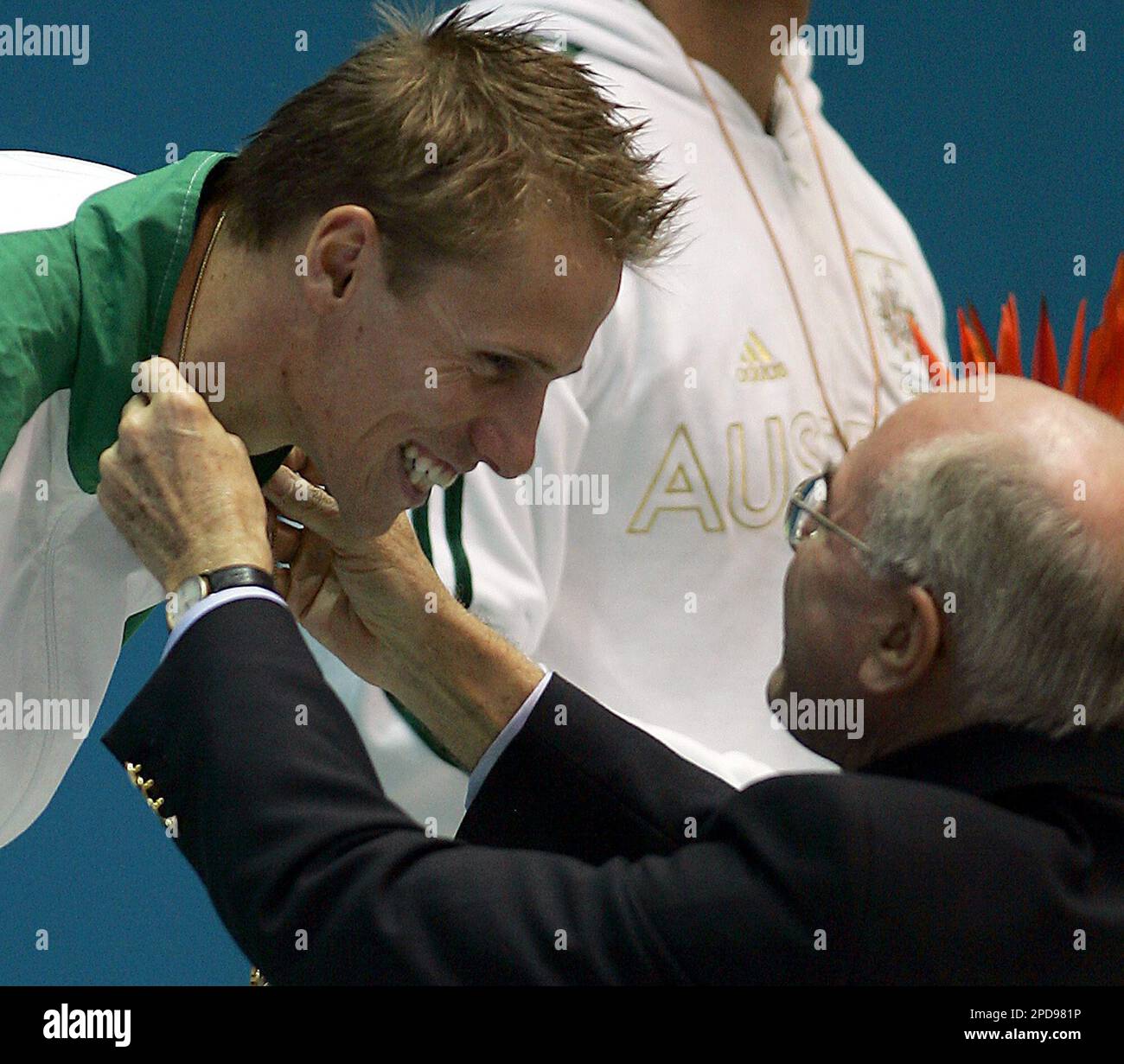 South Africa's Roland Schoeman looks at Australian Prime Minister John ...