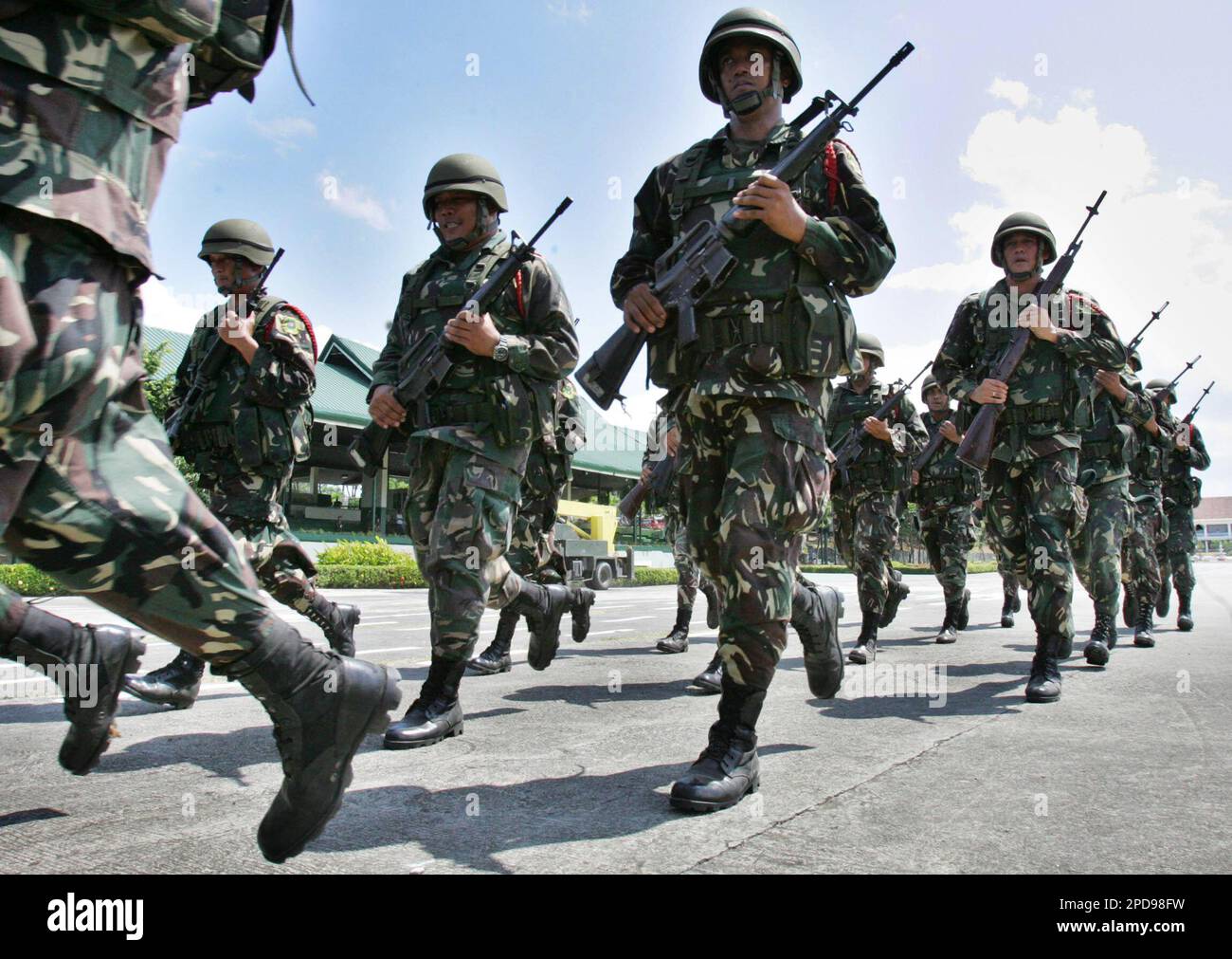 A unit of the Philippine Army marches during a rehearsal Saturday ...