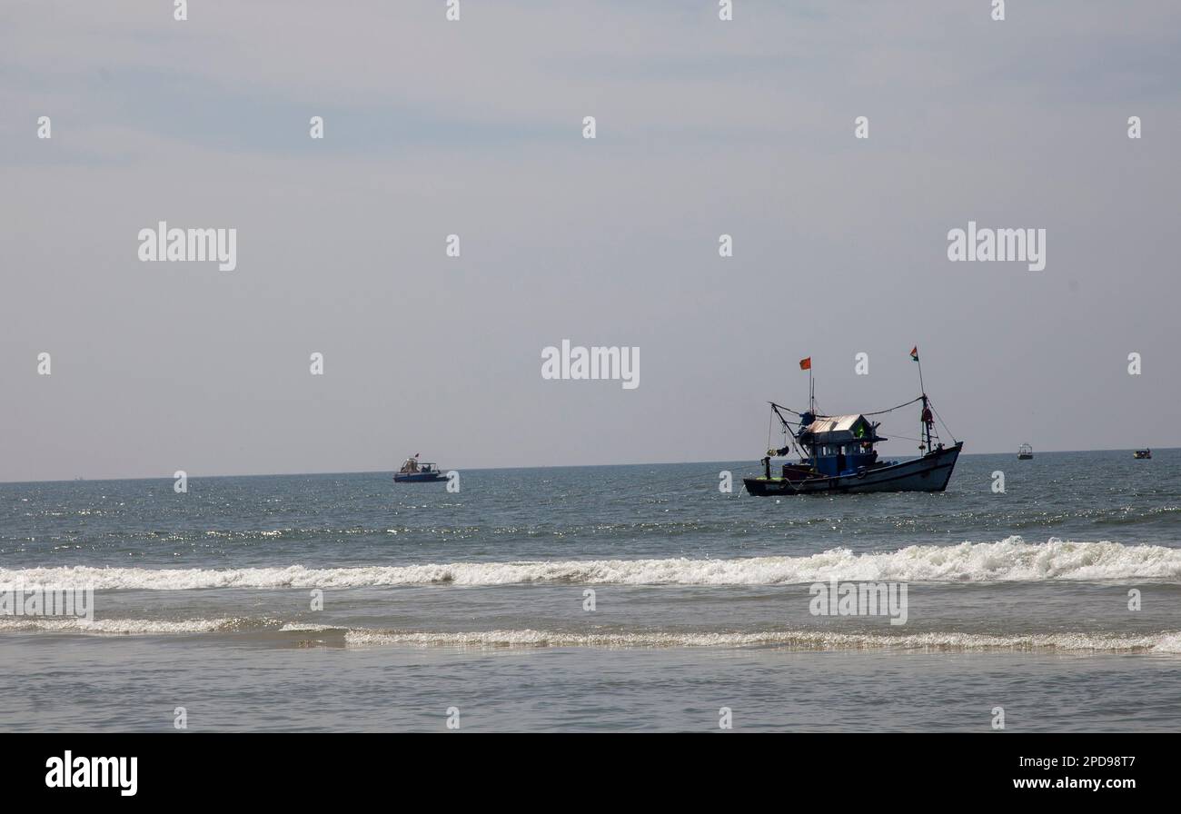 fishing trawlers in Indian ocean goa india, arabian sea Stock Photo - Alamy