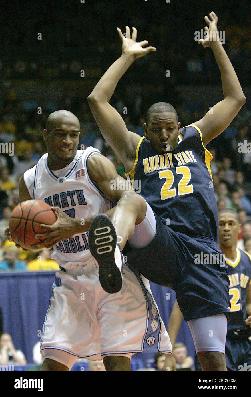 North Carolina's Reyshawn Terry, left, rebounds after Murray State's ...
