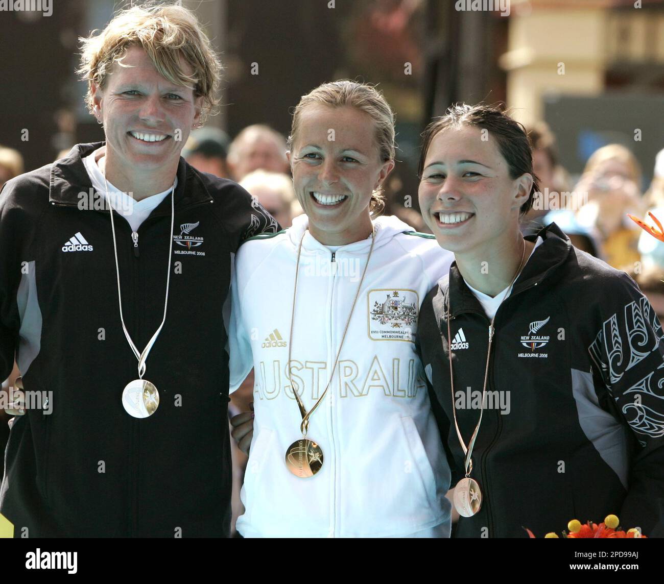 Gold medal winner Australian Emma Snowsill, center, is flanked by ...