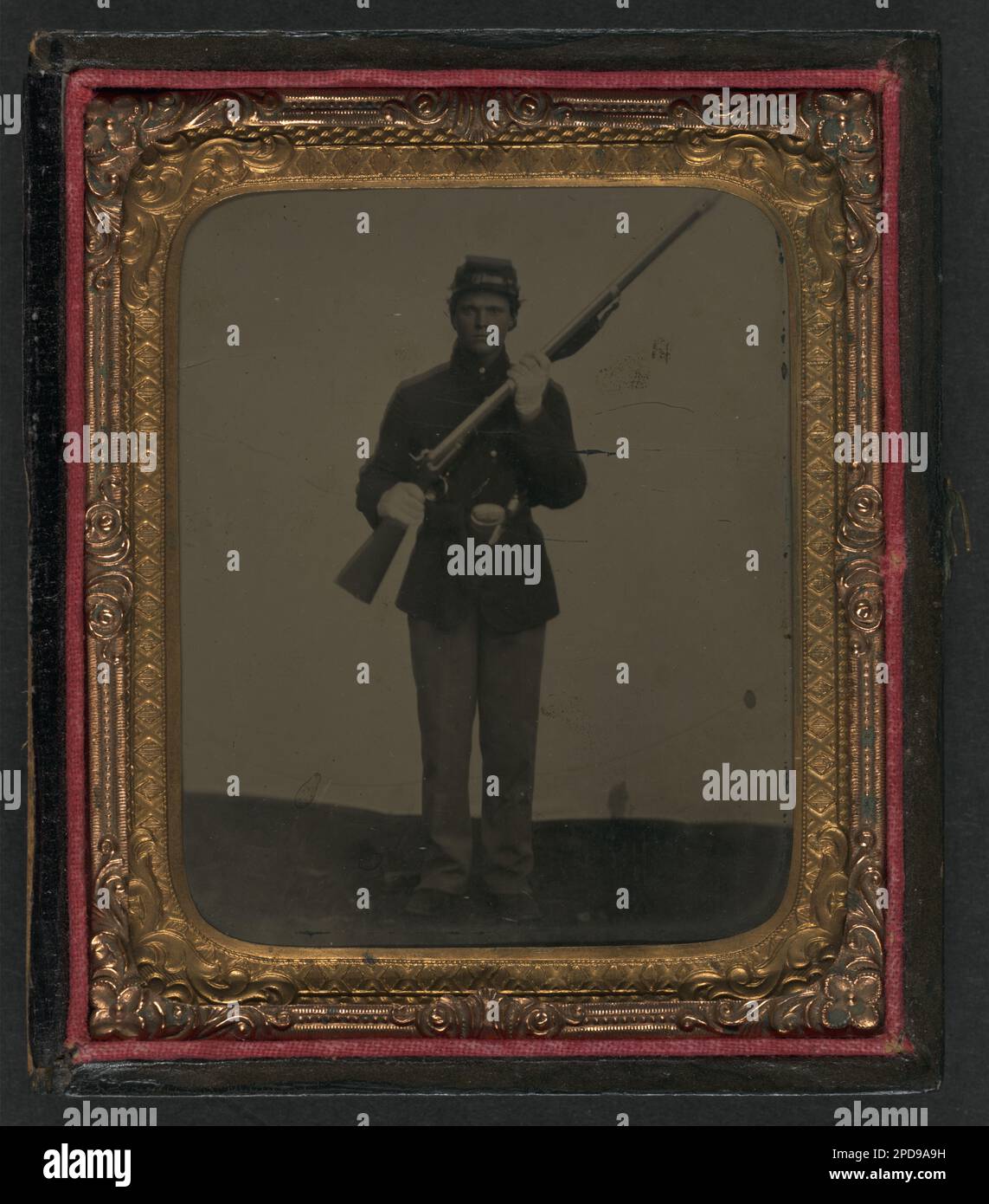 Unidentified soldier in Union uniform and dress gloves with musket ...