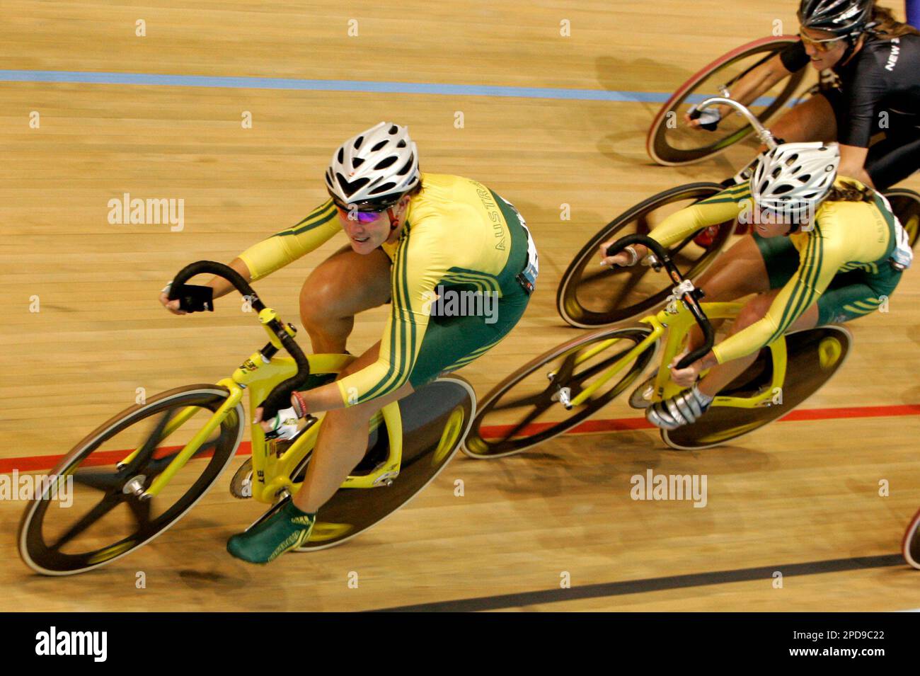 Australia's gold medallist Katherine Bates, left, leads her silver ...