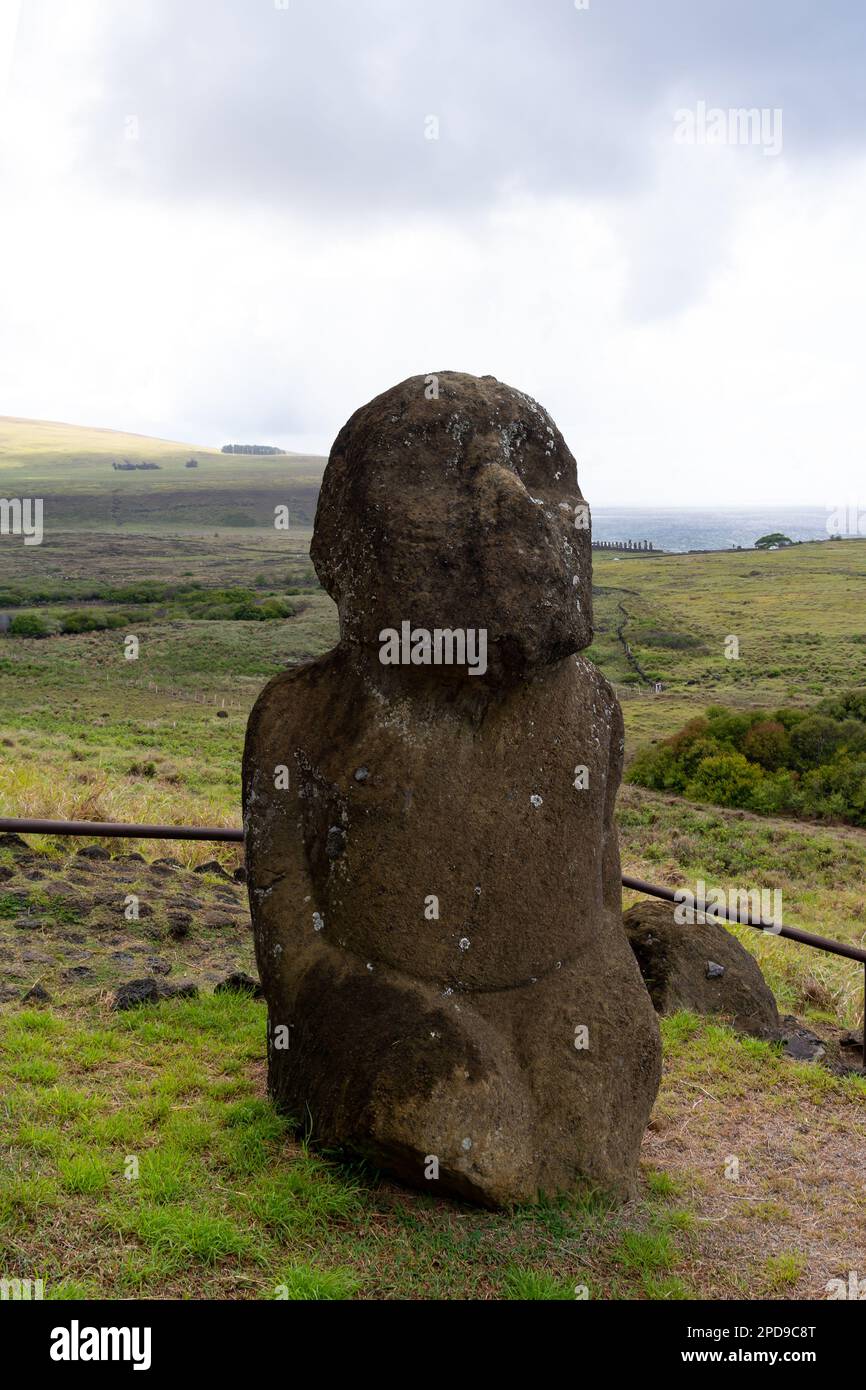 Front view of Moai Tukuturi statue at Rano Raraku on Easter Island ...