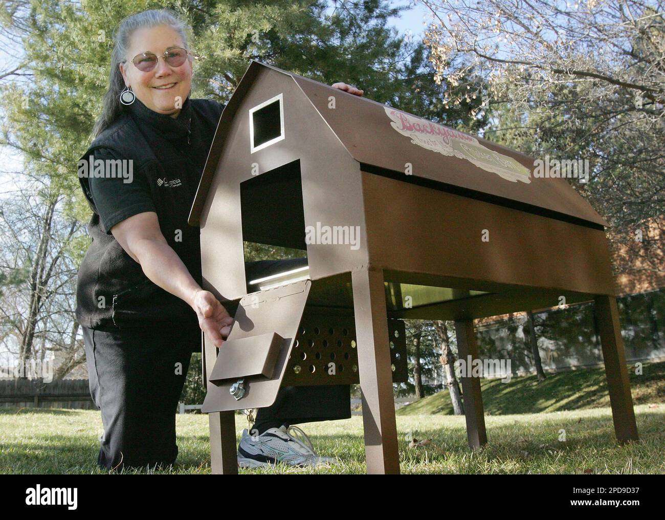 ** ADVANCE FOR TUESDAY, FEBRUARY 7 ** Susan Medlin kneels next to one ...