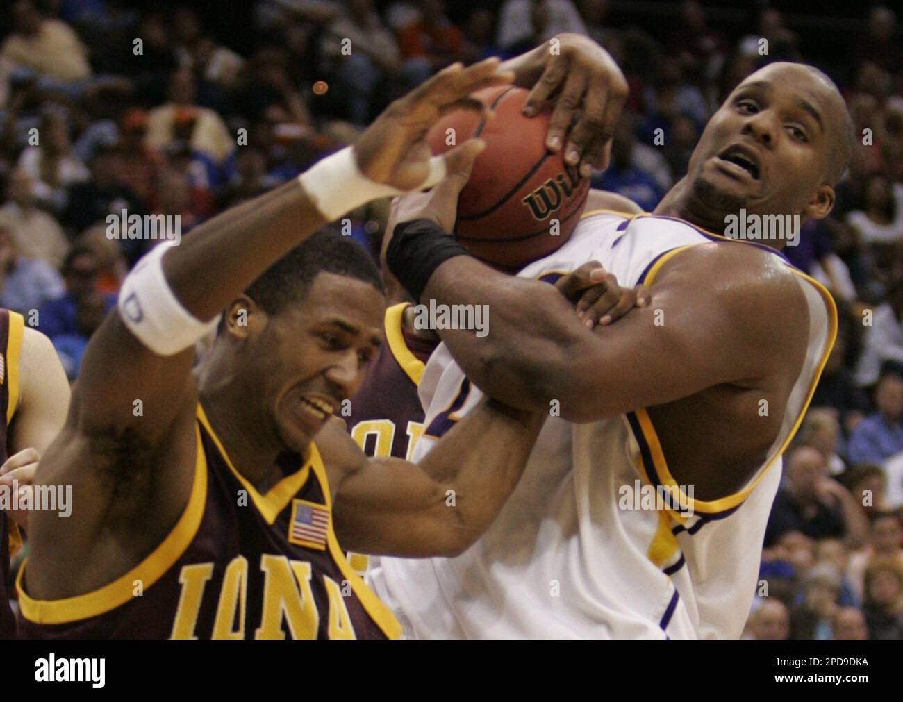 Louisiana State's Glen Davis, right, pulls a rebound away from Iona's ...