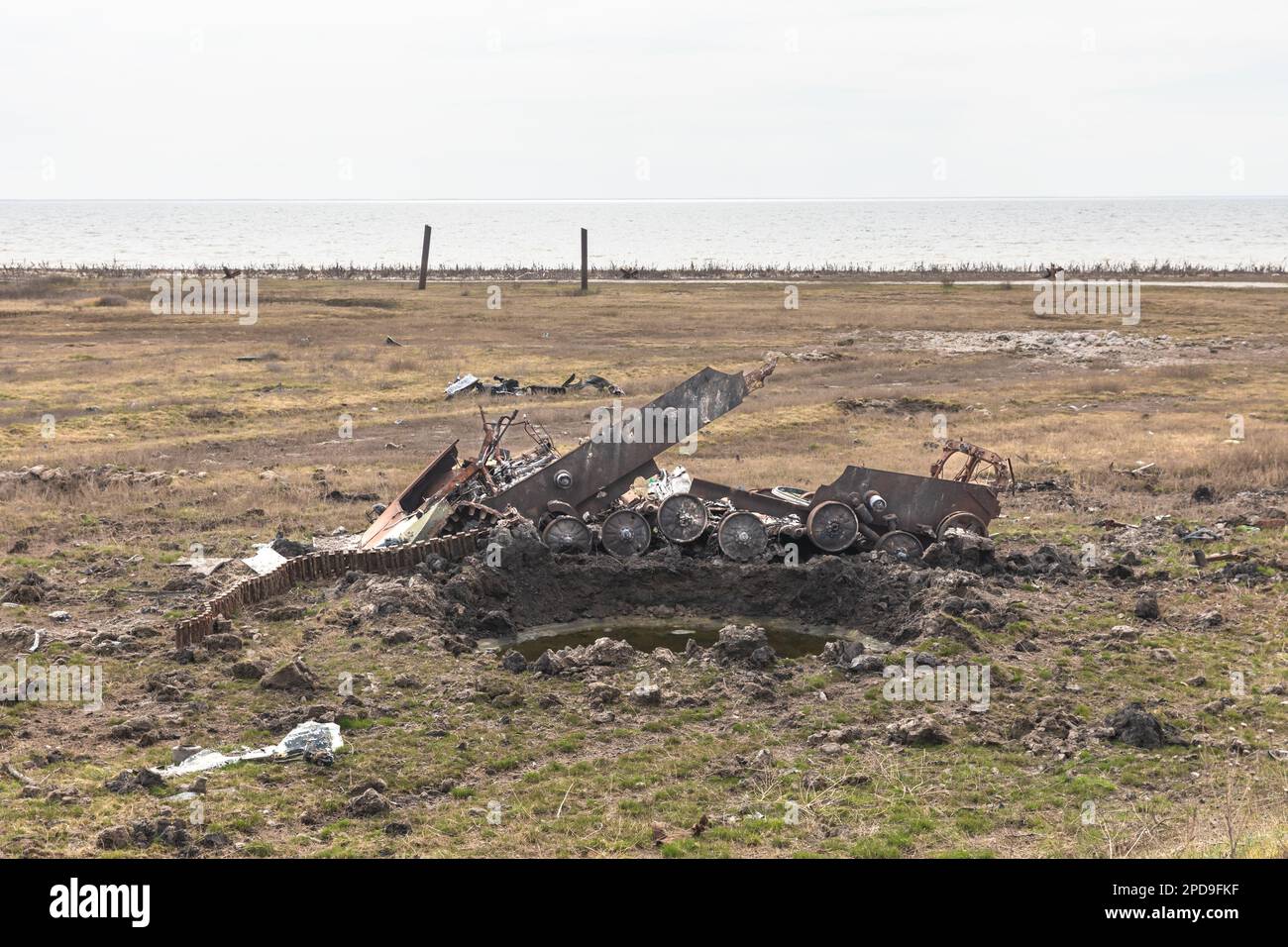 A crater can be seen from the explosion of a shell that destroyed the ...