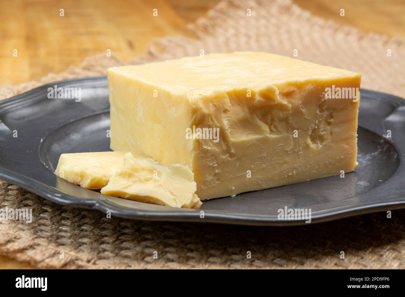 British cheeses collection, English matured smoked cheddar cheese close ...