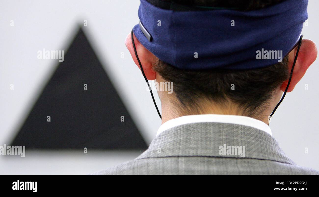 Mitsuhiro Aso, 27, a student of school for the blind, with Forehead ...