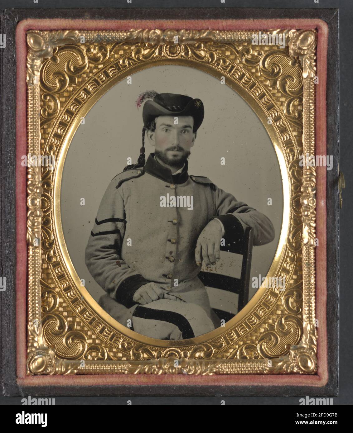 Unidentified corporal in Confederate uniform and hat with tassel ...