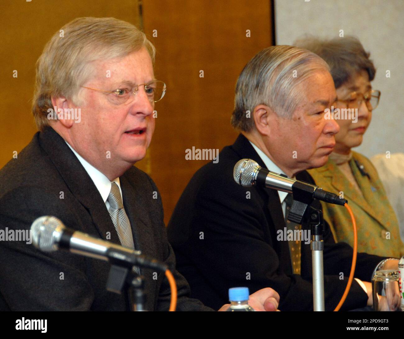 U.S. Ambassador to Japan Thomas Schieffer, left, answers questions ...