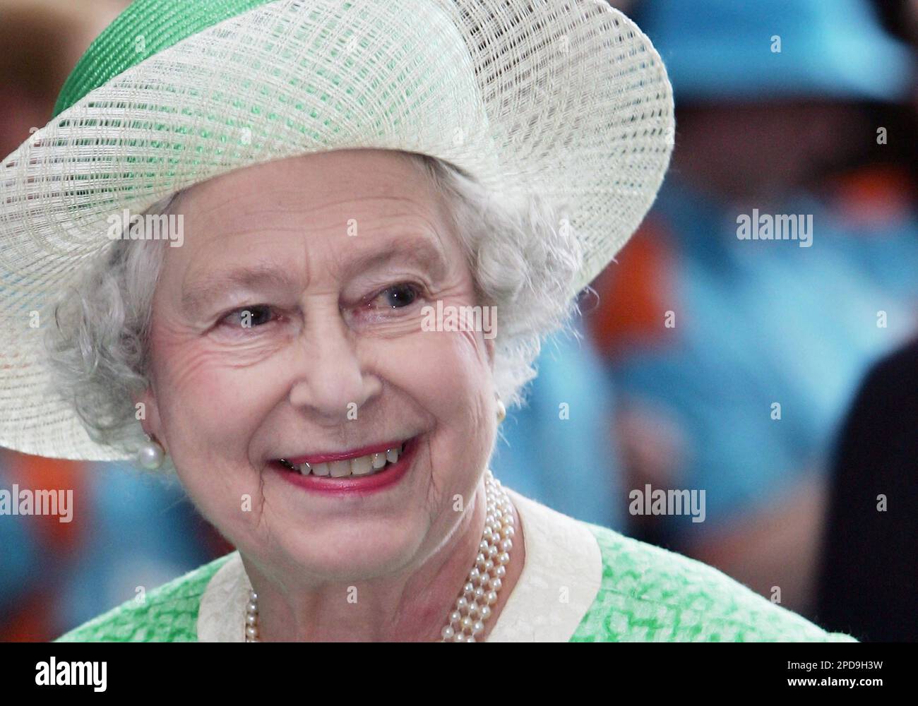 Britain's Queen Elizabeth II smiles upon her arrival at the Aquatic ...