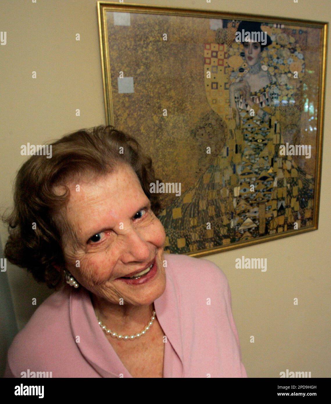 ** FILE ** Maria Altmann stands next to a print of a Gustav Klimt ...
