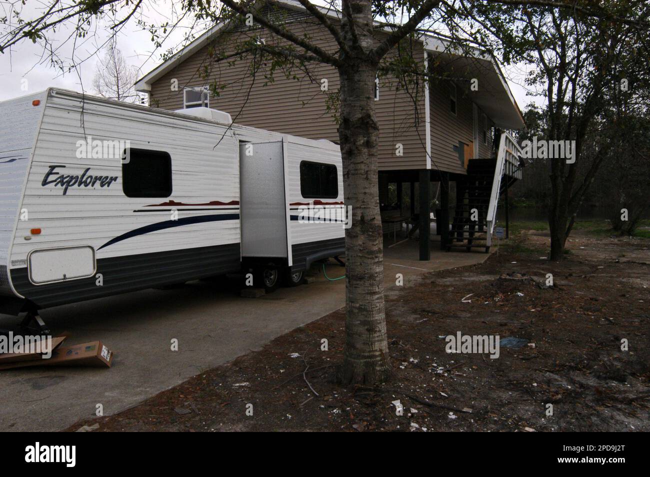 ** FILE ** The home of Dan Stansbury stands on the shore of the Jourdan ...