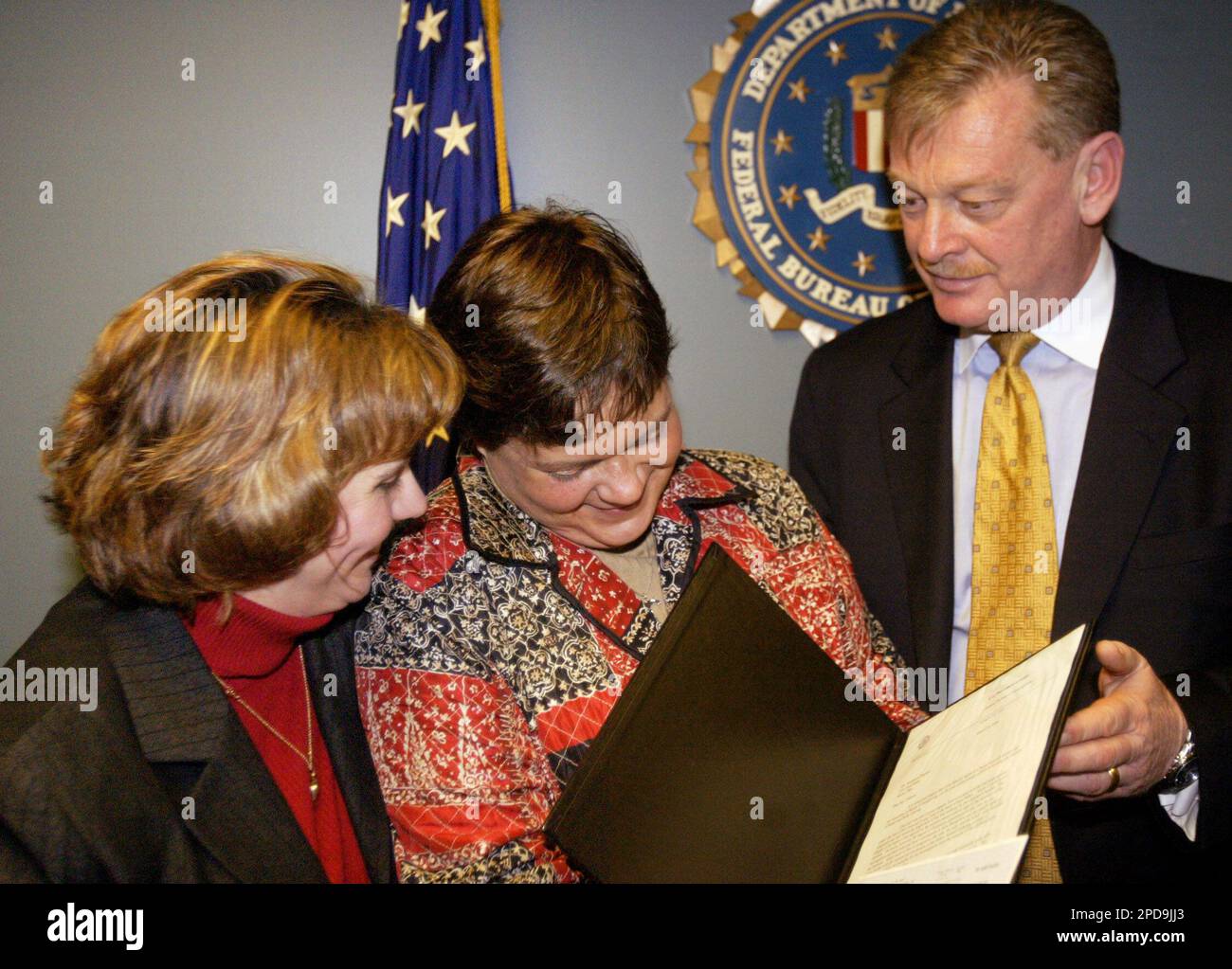 Stephanie Dietrich of Akron, Ohio, holds a citation recognizing her ...