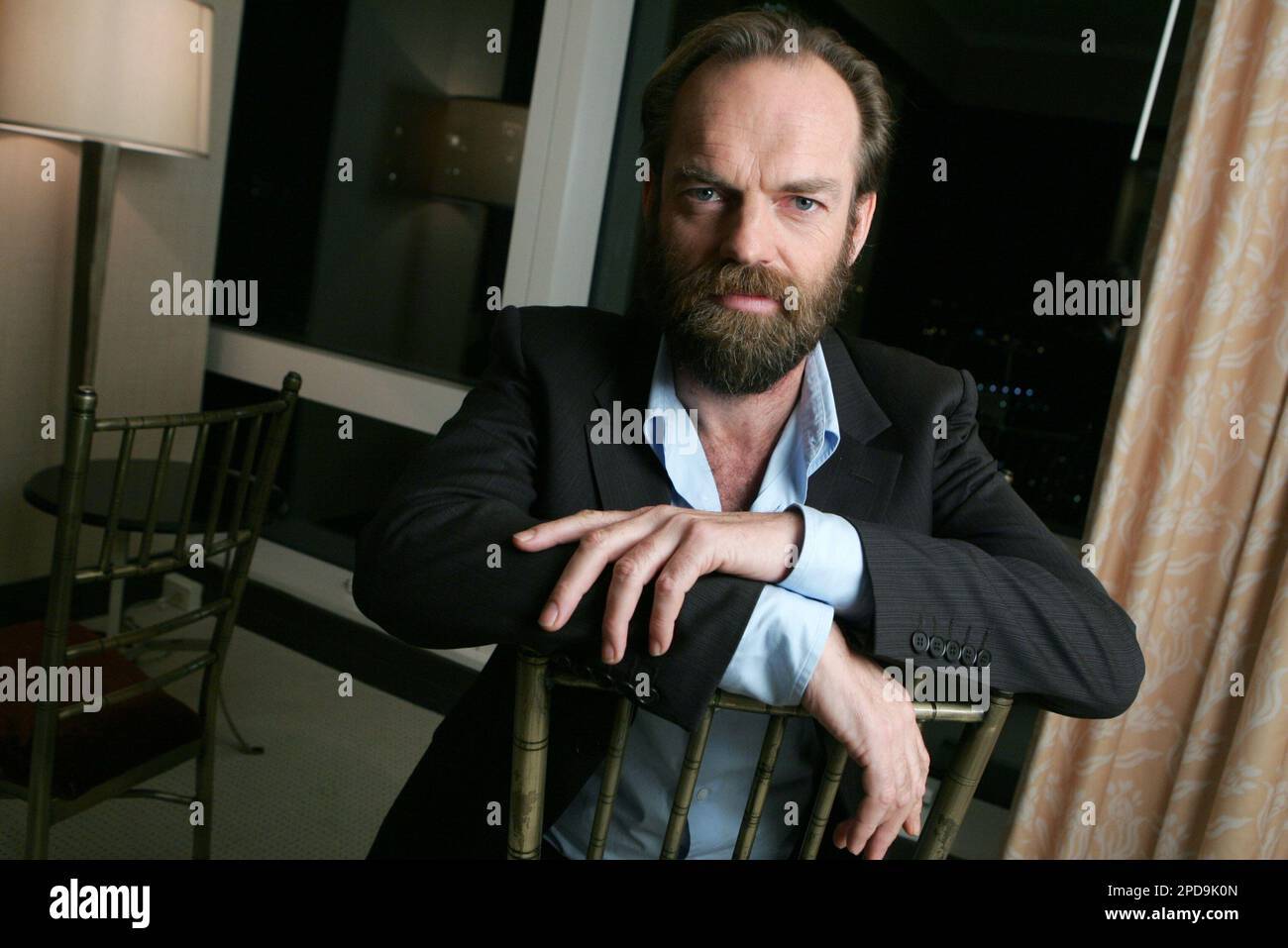 Actor Hugo Weaving poses during a photo session Sunday, Feb. 26, 2006 ...