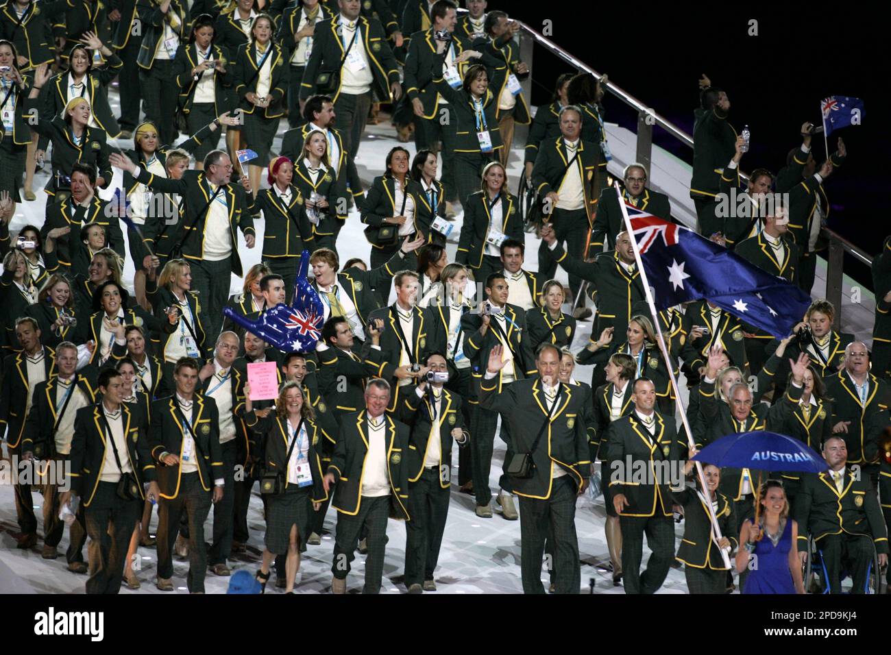 Australian athletes march in the Melbourne Cricket Ground during the ...