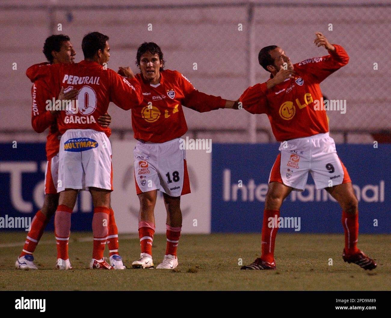 Roberto Silva, right, of Perus Cienciano, celebrates with his teammates ...
