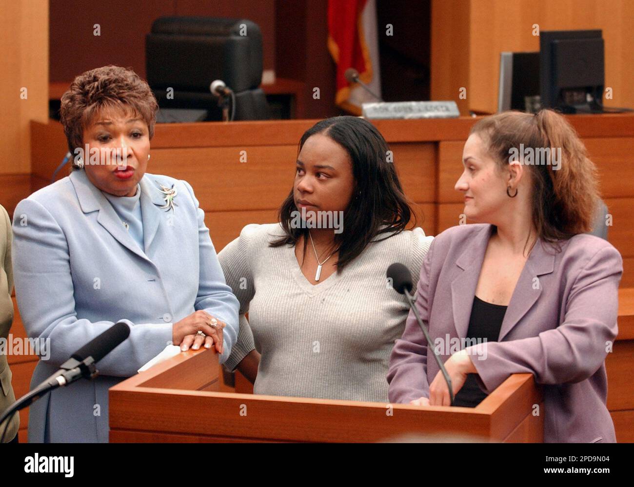 Jo Ann McClinton, left, the mother of Lita Sullivan, meets with jurors ...
