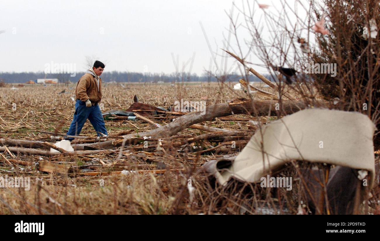 Joe Starks walks through a field in Renick, Mo., Monday, 13, 2006 ...