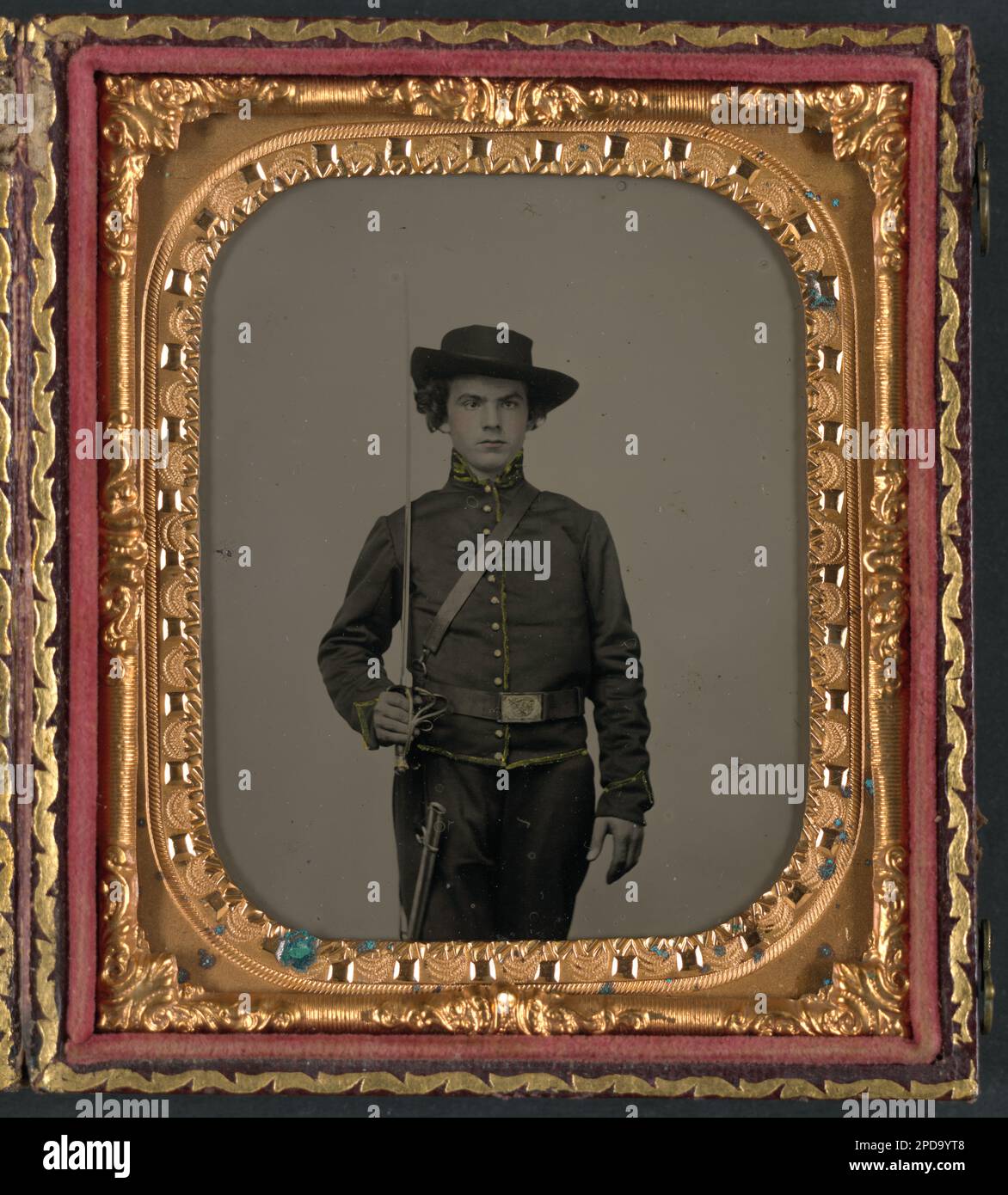 Unidentified soldier in Union uniform with cavalry saber and scabbard ...