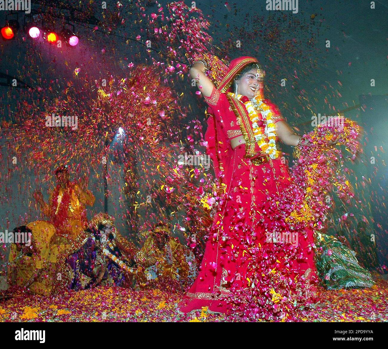 An Indian performer dressed as Radha, one of Hindu God Krishna's ...