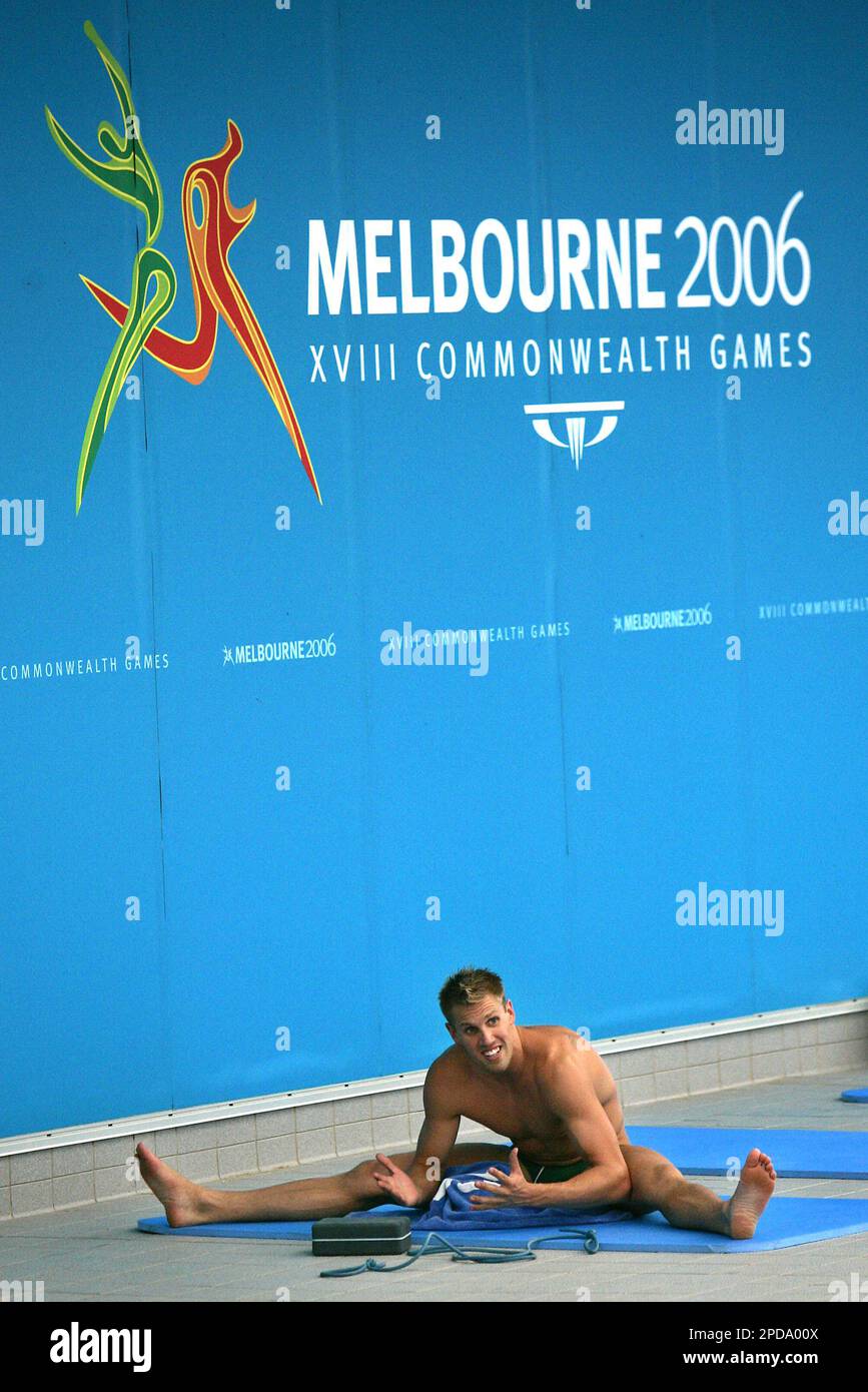 Australian swimmer Jim Piper stretches under a Melbourne 2006 ...