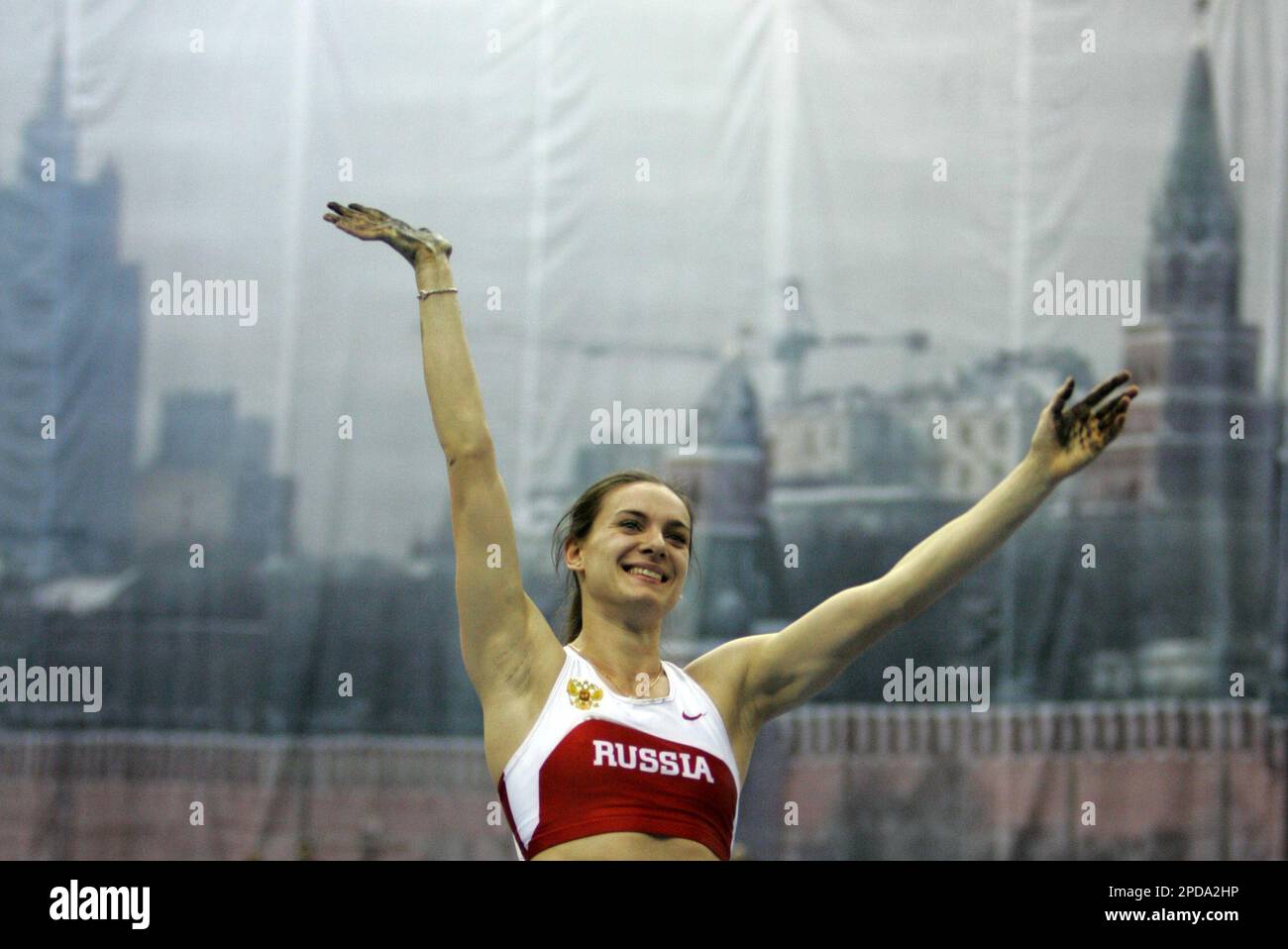 Russia's Yelena Isinbayeva celebrates after she won the Women's Pole ...