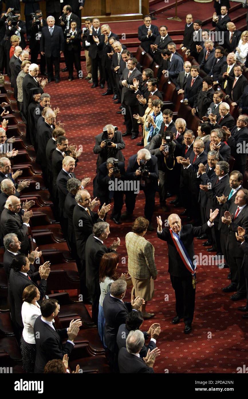 Outgoing Chile's President Ricardo Lagos waves to the public as he ...