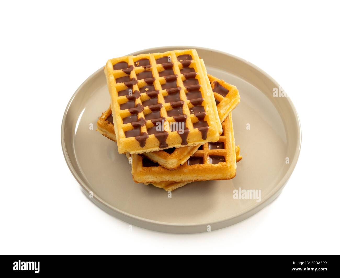 Chocolate waffles on a plate isolated on white background. Waffles in ...