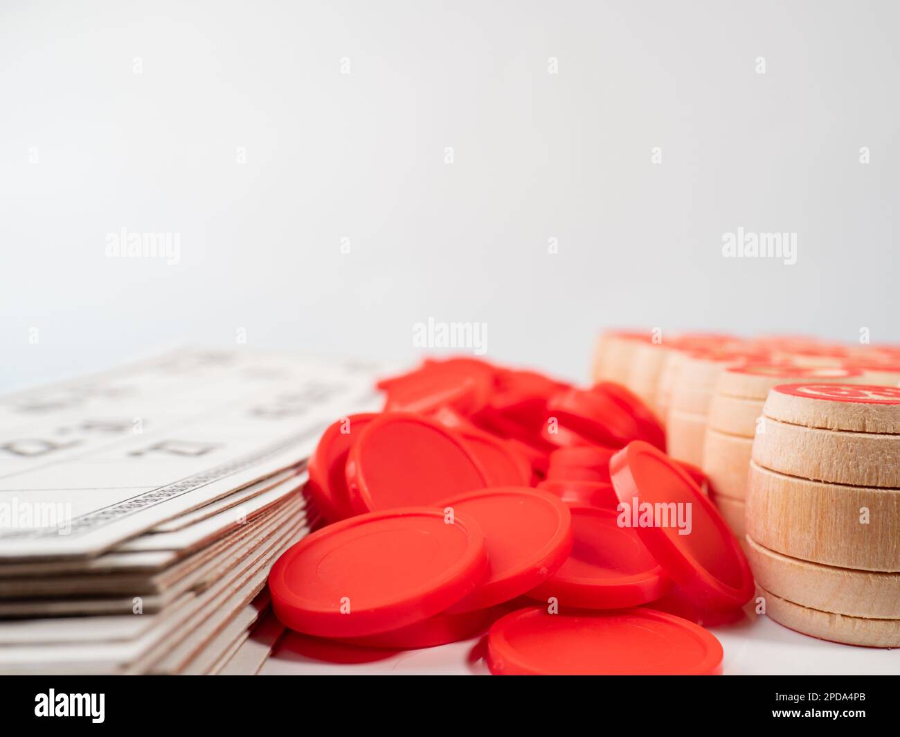 Board game bingo. Wooden barrels with lotto numbers, playing cards for ...