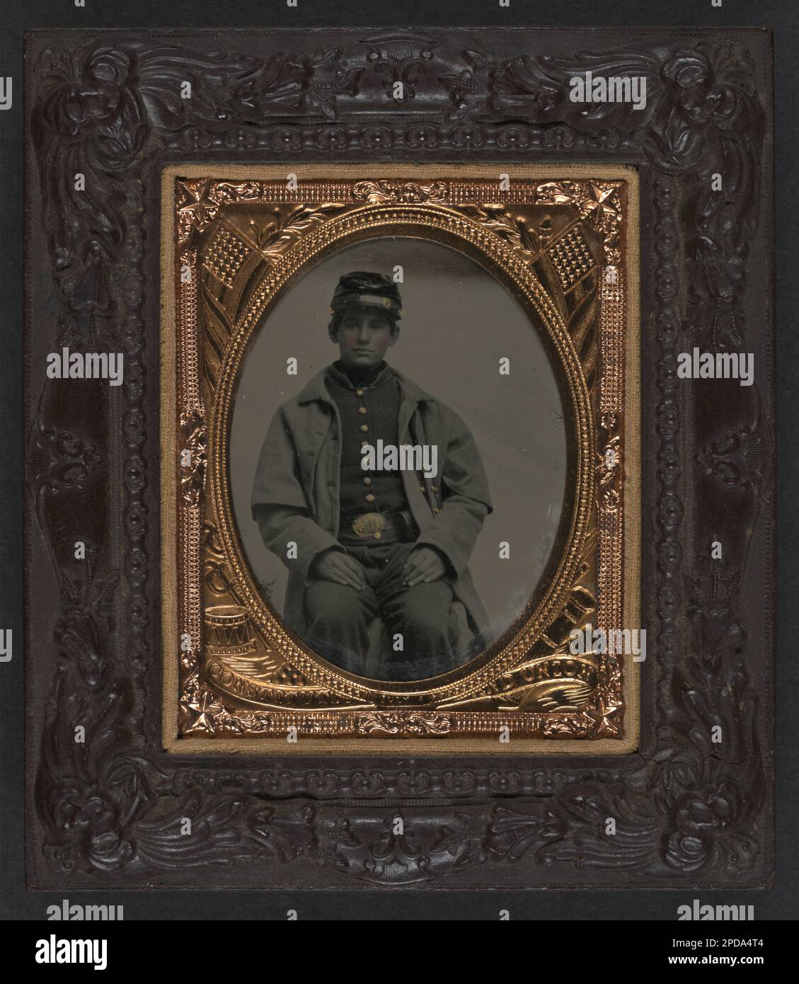 Unidentified young soldier in Union frock coat and forage cap. United ...