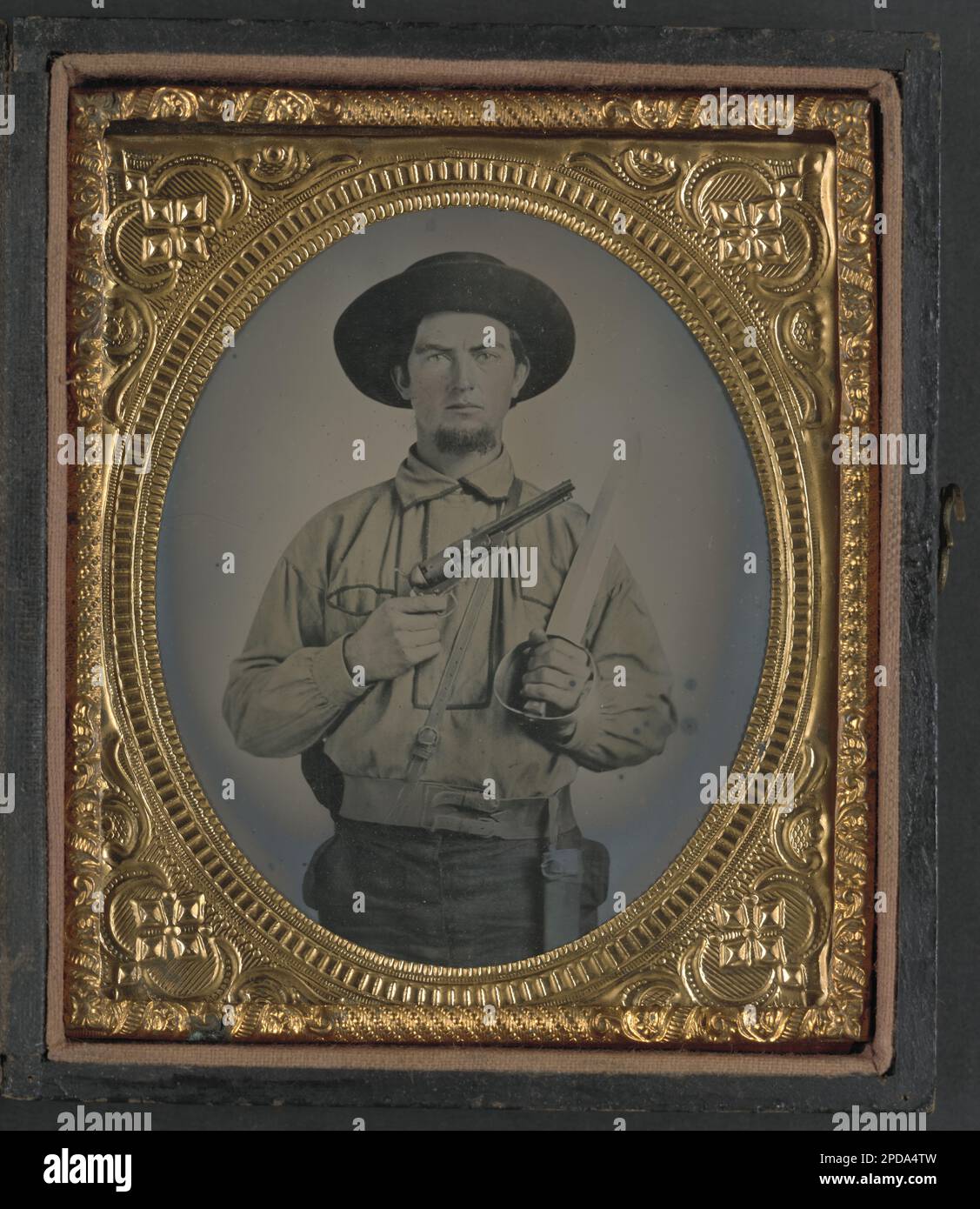 Unidentified soldier in Confederate uniform with Colt Navy revolver and ...