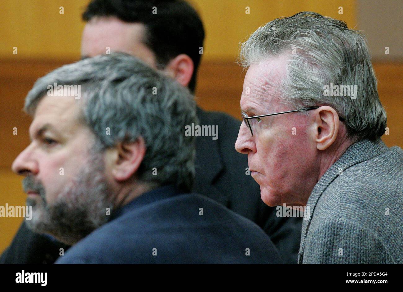 James Sullivan, right, and his attorney Don Samuel, left, listen as a ...