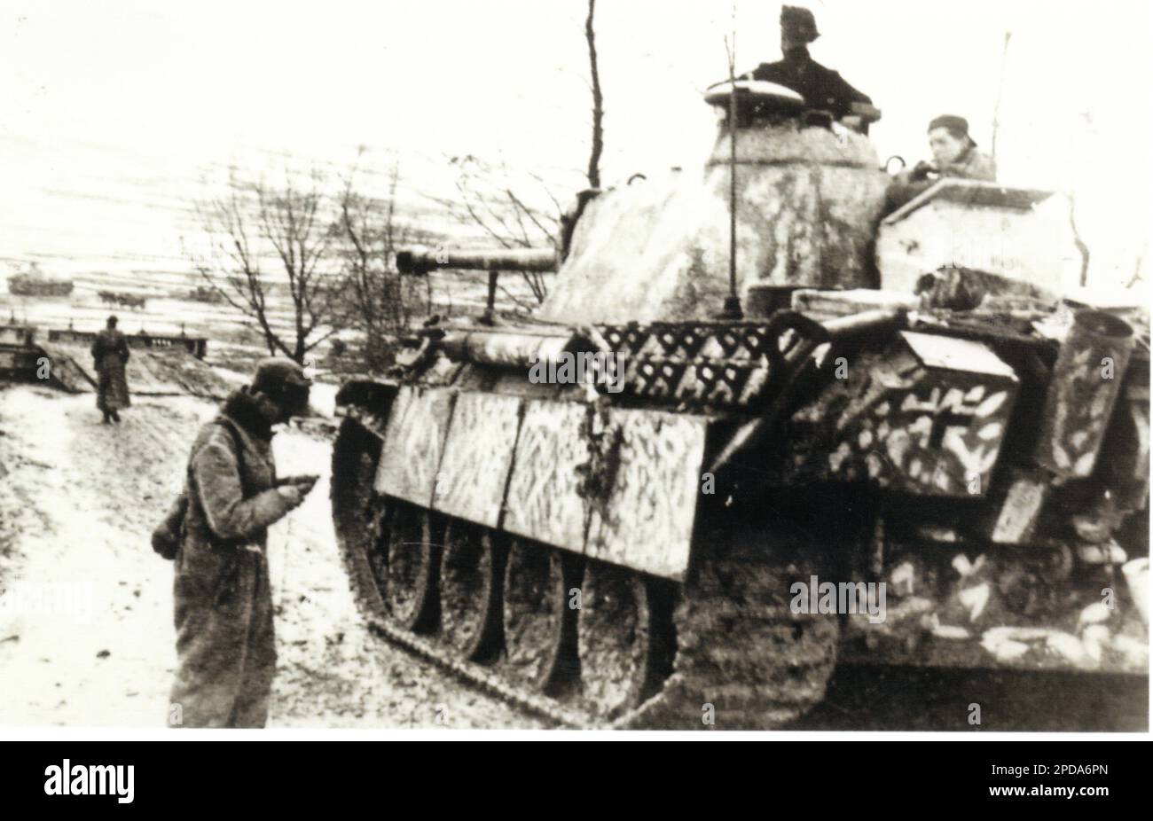 World War Two B&W photo A German panther Tank stands idle on road in ...