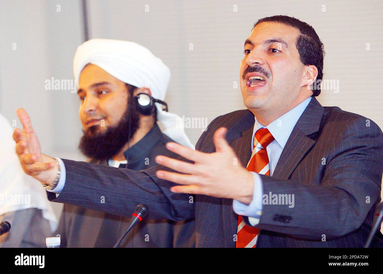 Amr Khaled, a popular Egyptian preacher, speaks at a religious summit in Copenhagen, Denmark ...