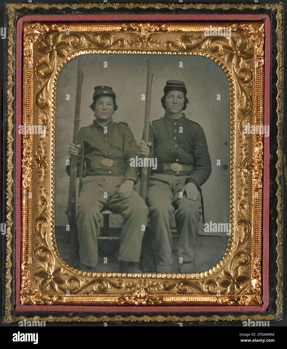 Two unidentified soldiers in Union uniforms holding muskets ...