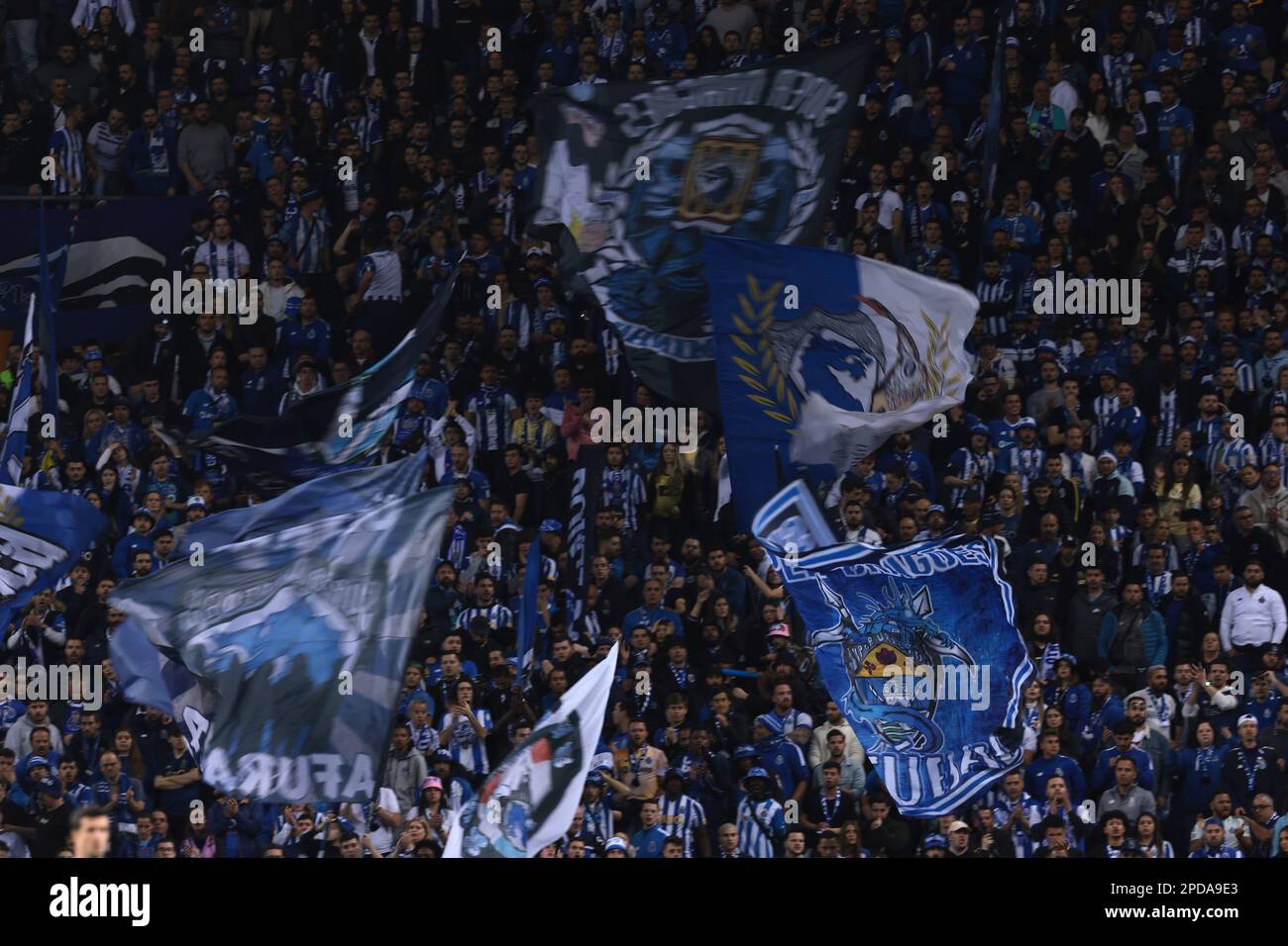 Porto, Portugal. 14th Mar, 2023. FC Porto fans wave giant flags during ...