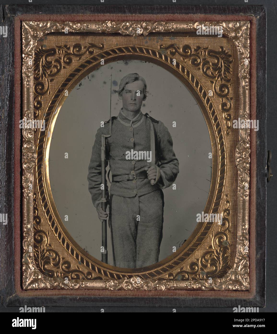 Unidentified soldier in Confederate uniform with musket and D-guard ...