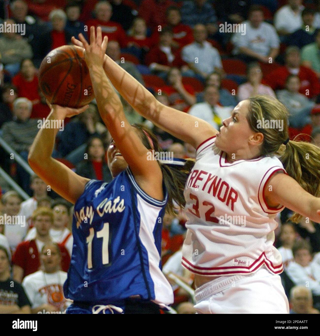 Treynor's Tricia Trotter defends against Charter Oak Ute's Amanda ...