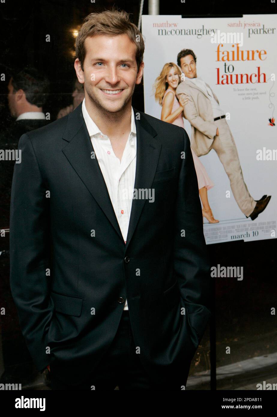 Bradley Cooper poses for photographers as he arrives at the world ...