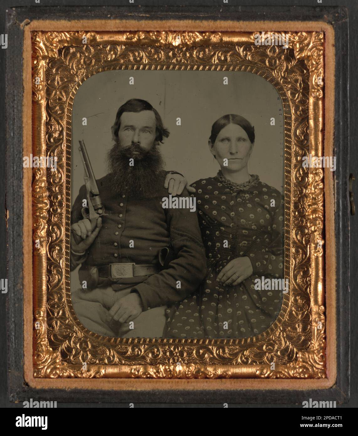 Unidentified soldier in Union uniform with revolver and his wife ...