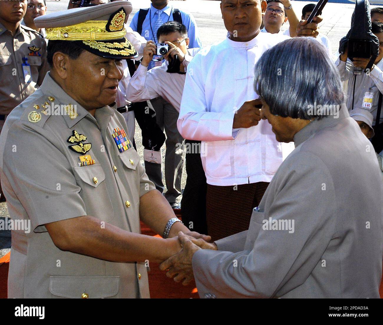 Myanmar junta leader Senior Gen. Than Shwe, left, greets Indian ...
